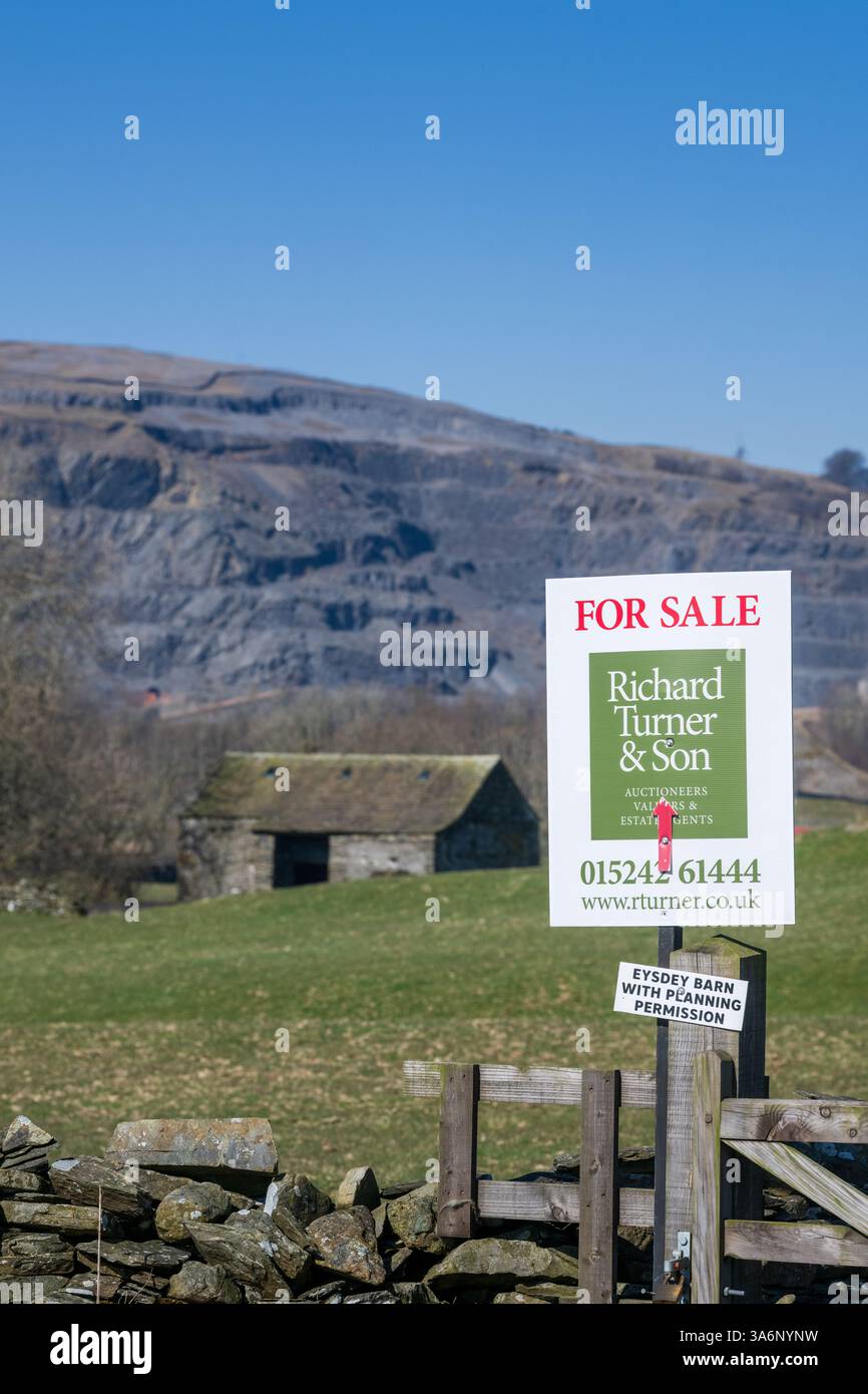 "Barn with planning permission for sale" sign in a field in the ...