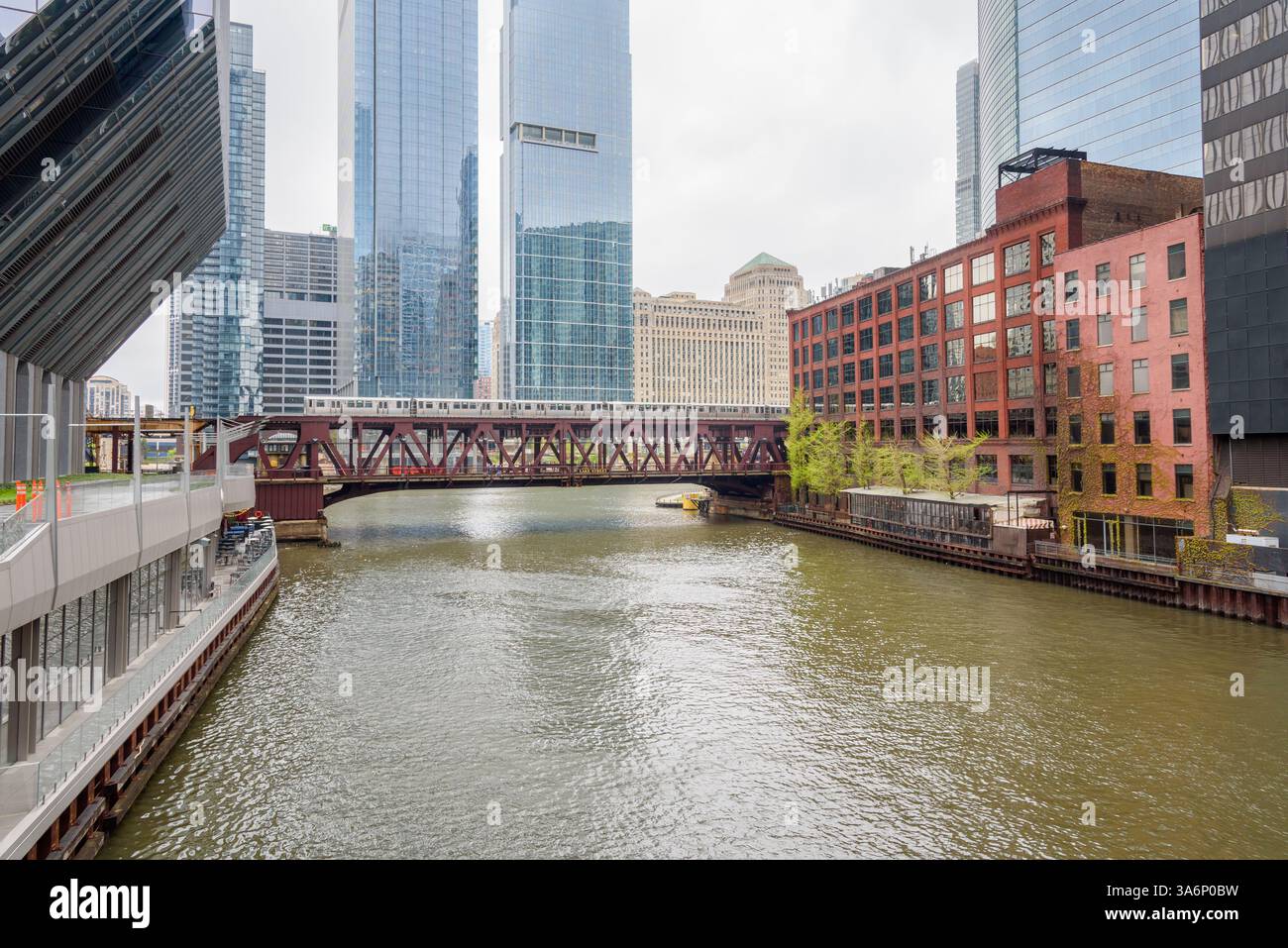 Subway train crossing a double deck bridge across Chicago river on a ...