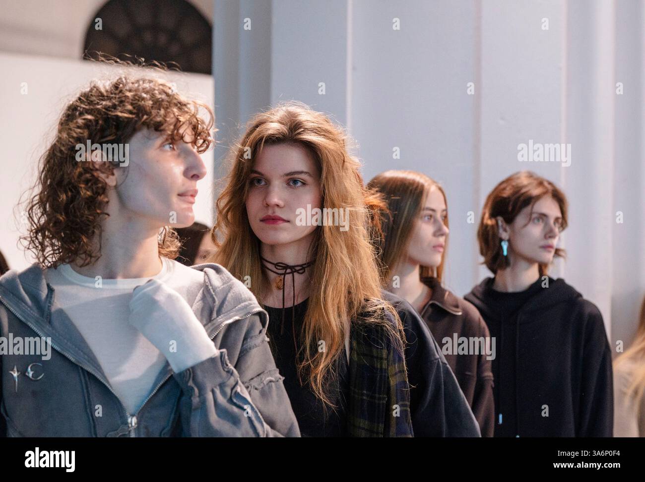 Kyiv, Ukraine - Feb 14, 2025: Models and designers engage in vibrant ...