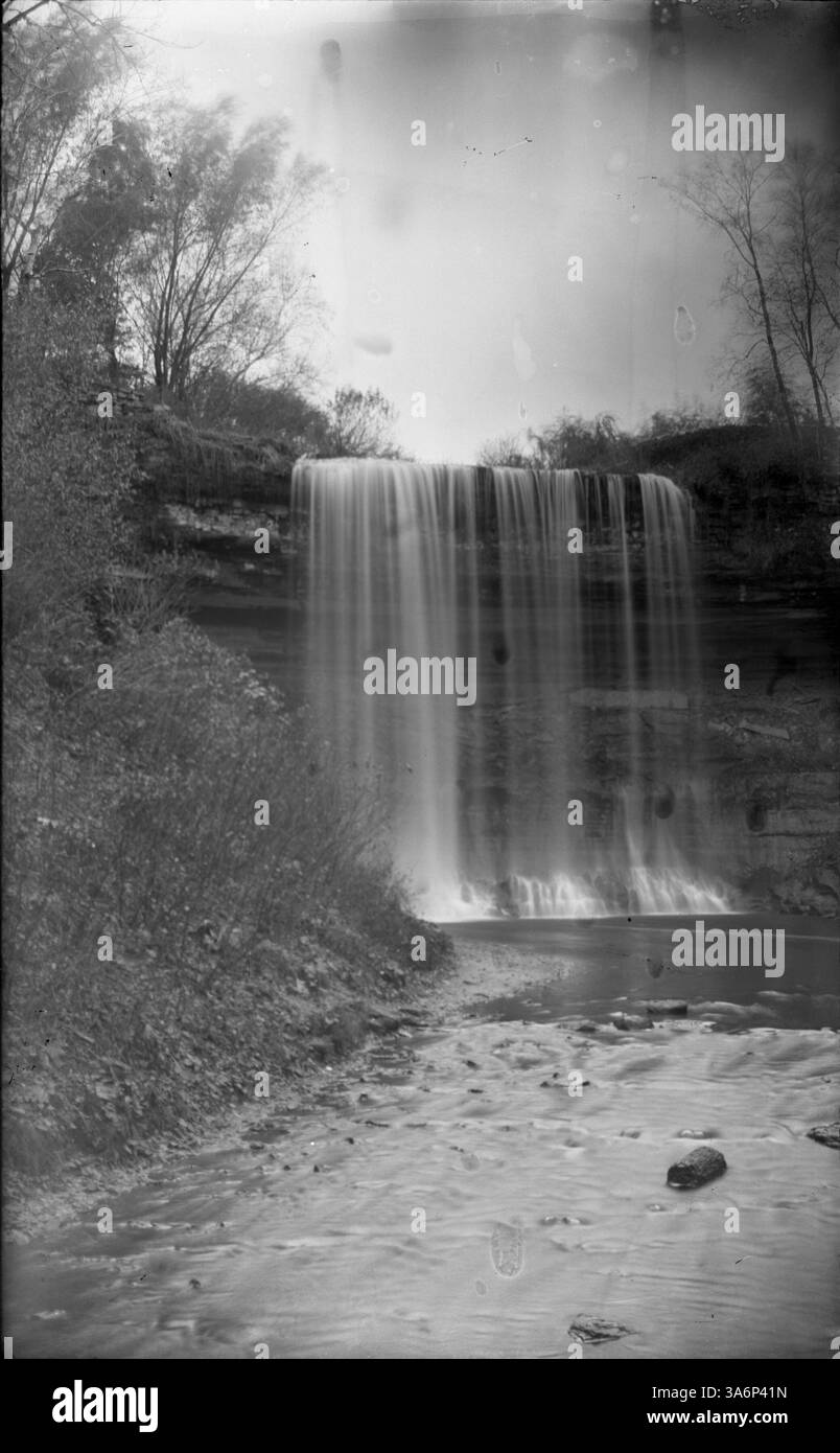 Minnehaha falls shows a light flow of water hi-res stock photography ...