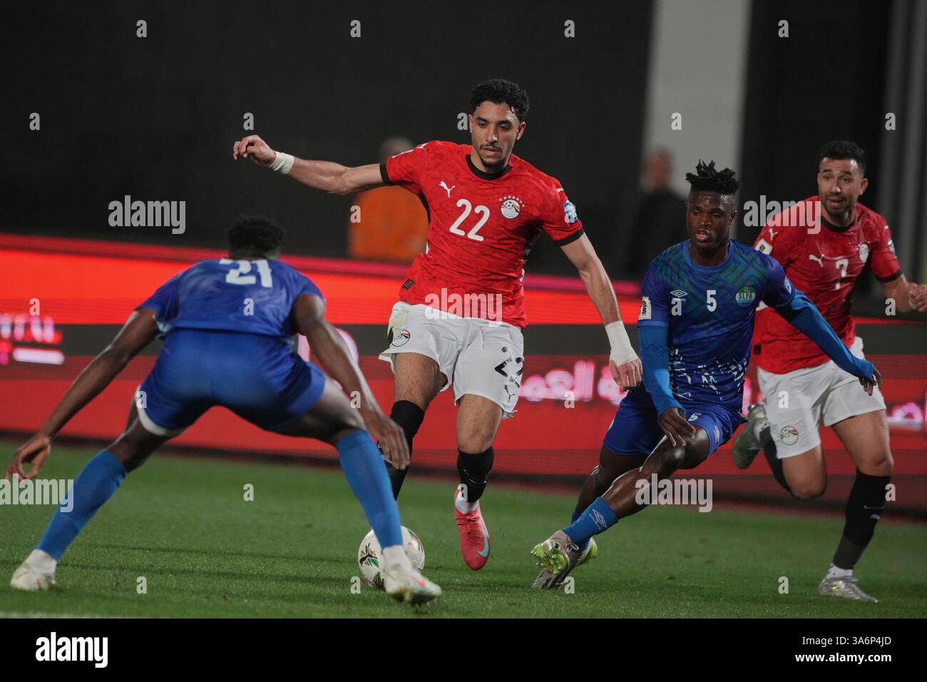 Egypt's Omar Marmoush, passes through Sierra Leone's players during a World Cup 2026 qualifying ...