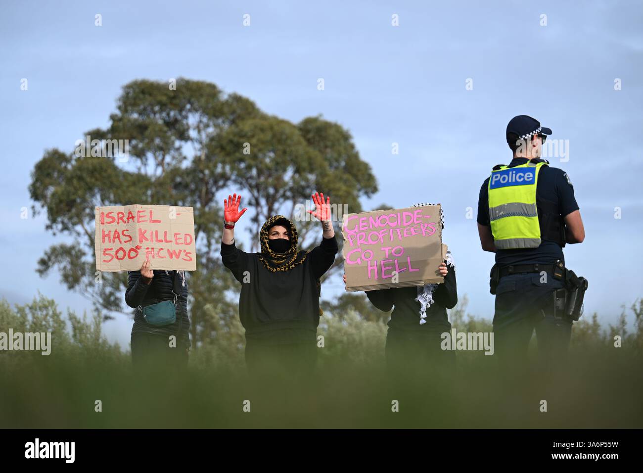 Anti war activists protest near to the Avalon Australian International ...