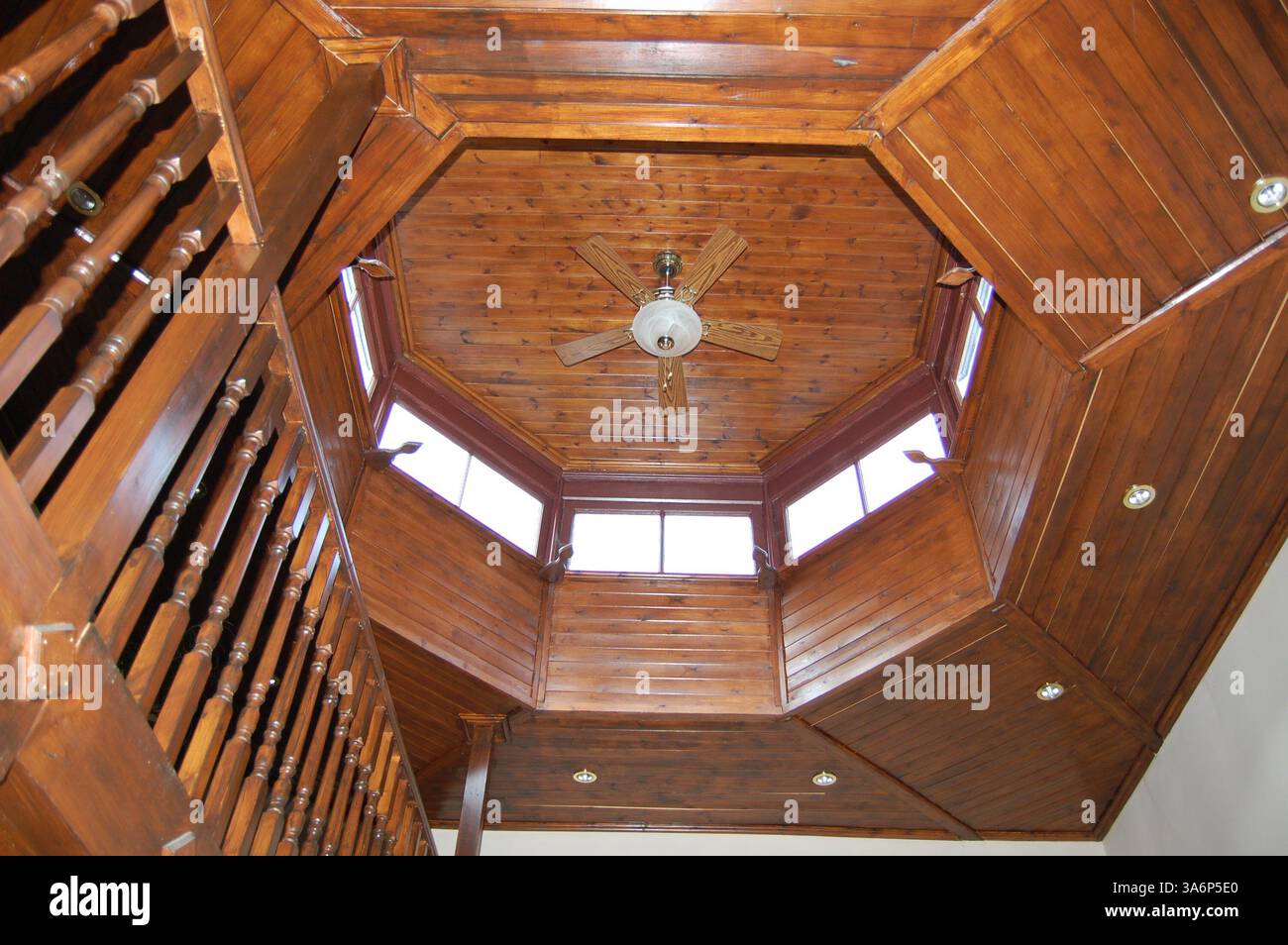 Light well and staircase, with wood panelling, Ellingham Hall ...