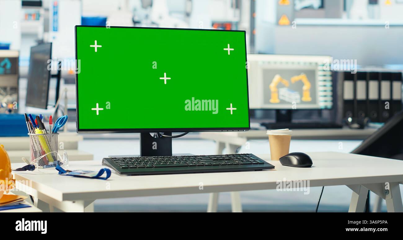 Isolated screen PC in empty photovoltaics factory used to build models ...