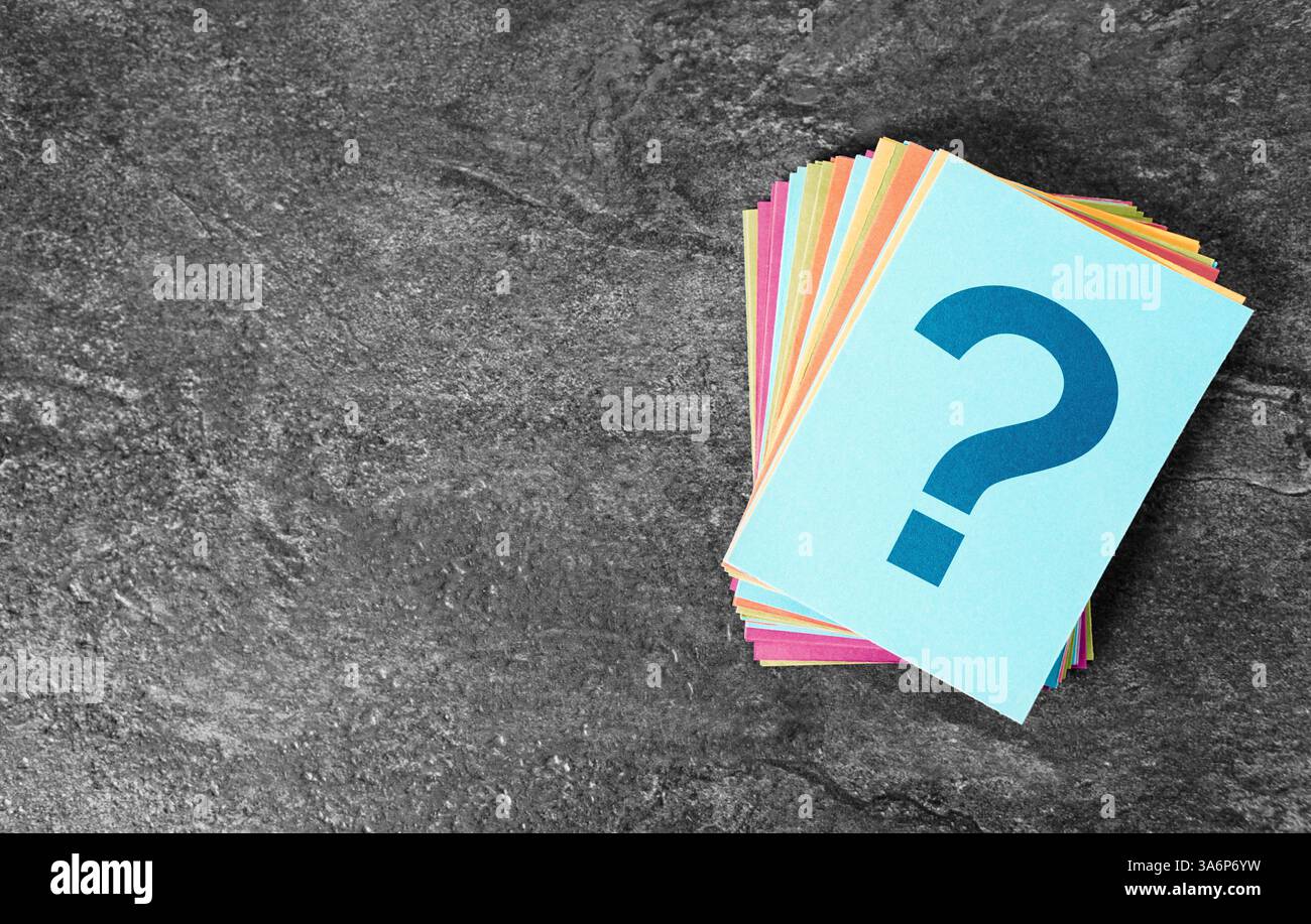 Question mark sign and symbol on colorful paper notes stack business ...