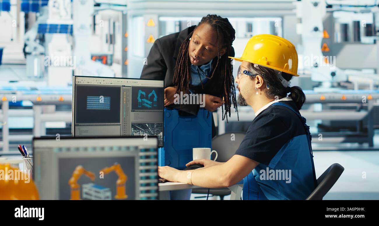 Photovoltaics factory engineer making facility adjustment in CAD ...