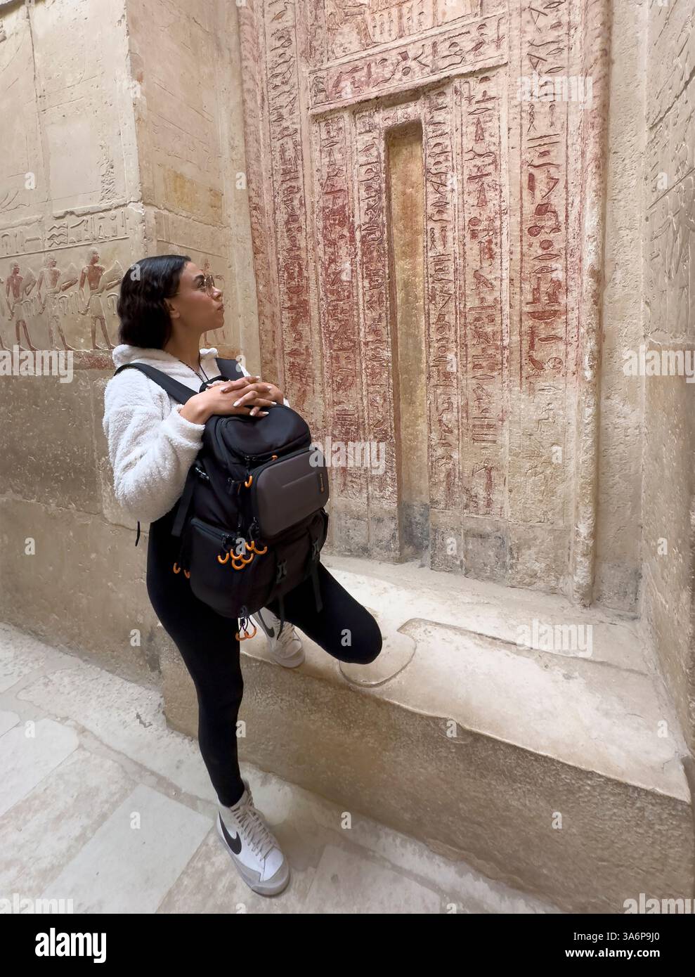 Cairo, Egypt; January 20, 2024: Watch a tourist deciphering the ancient ...