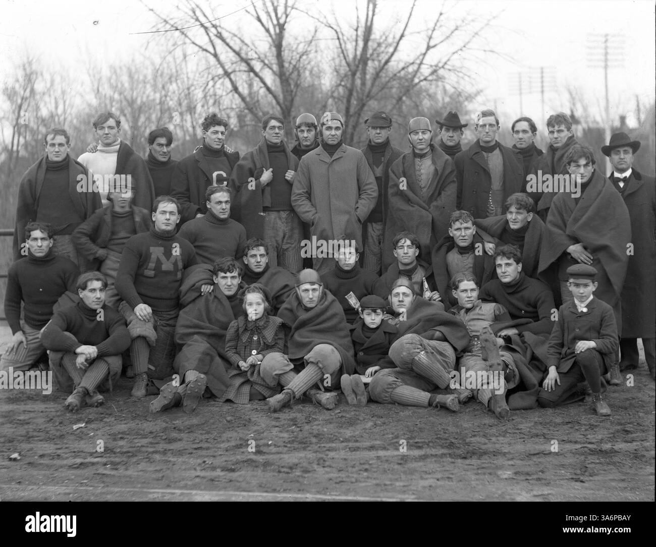 A photograph of the University of Minnesota football team, showcasing ...