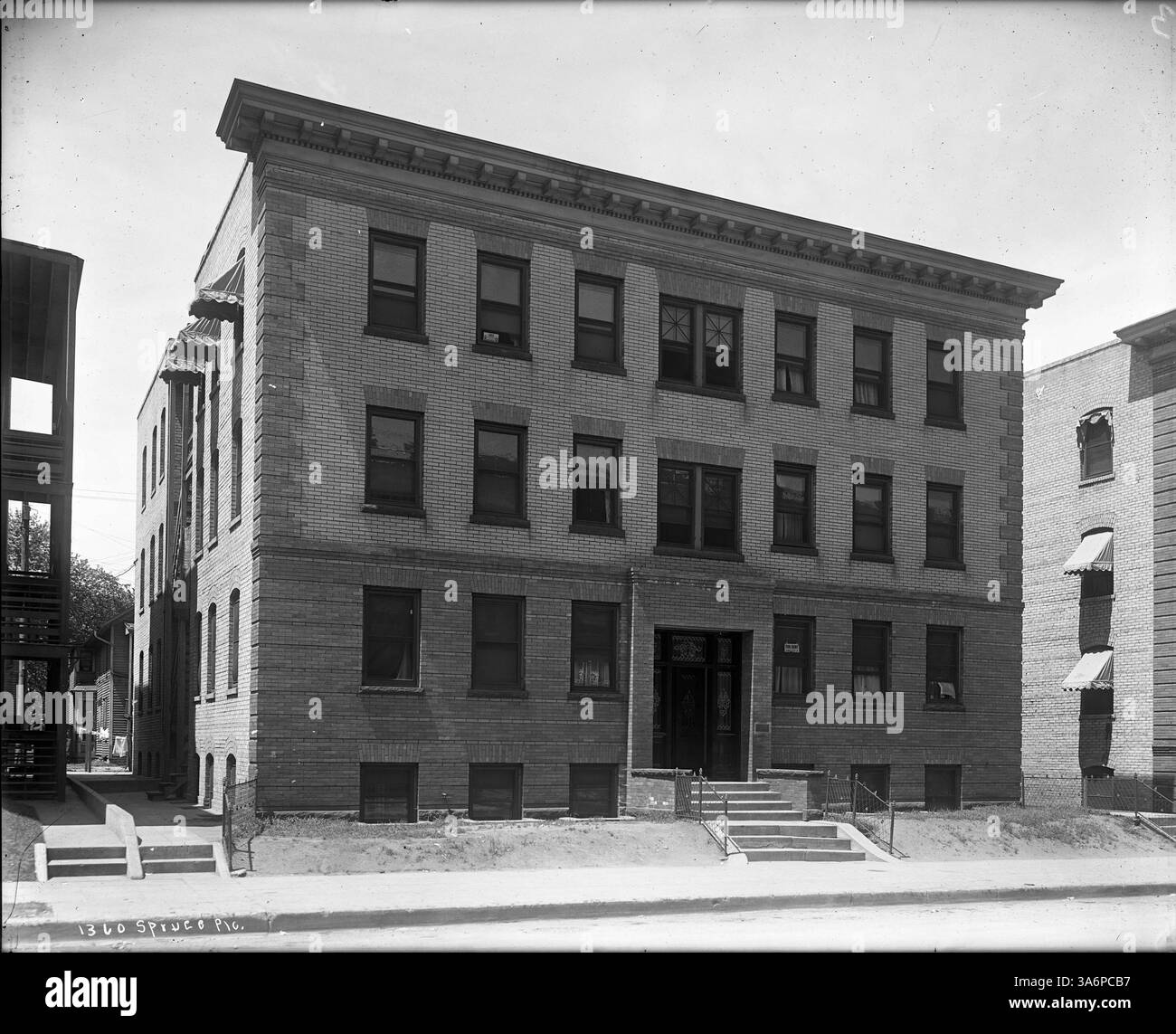 This apartment house located on Spruce Place is an example of early ...