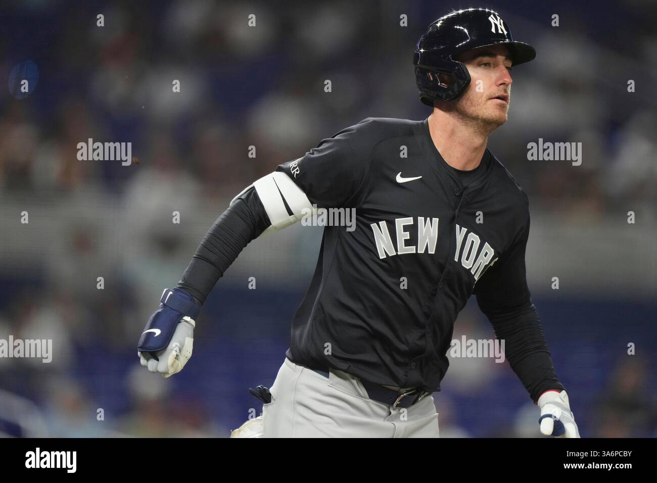 New York Yankees' Cody Bellinger runs after hitting a single during the ...