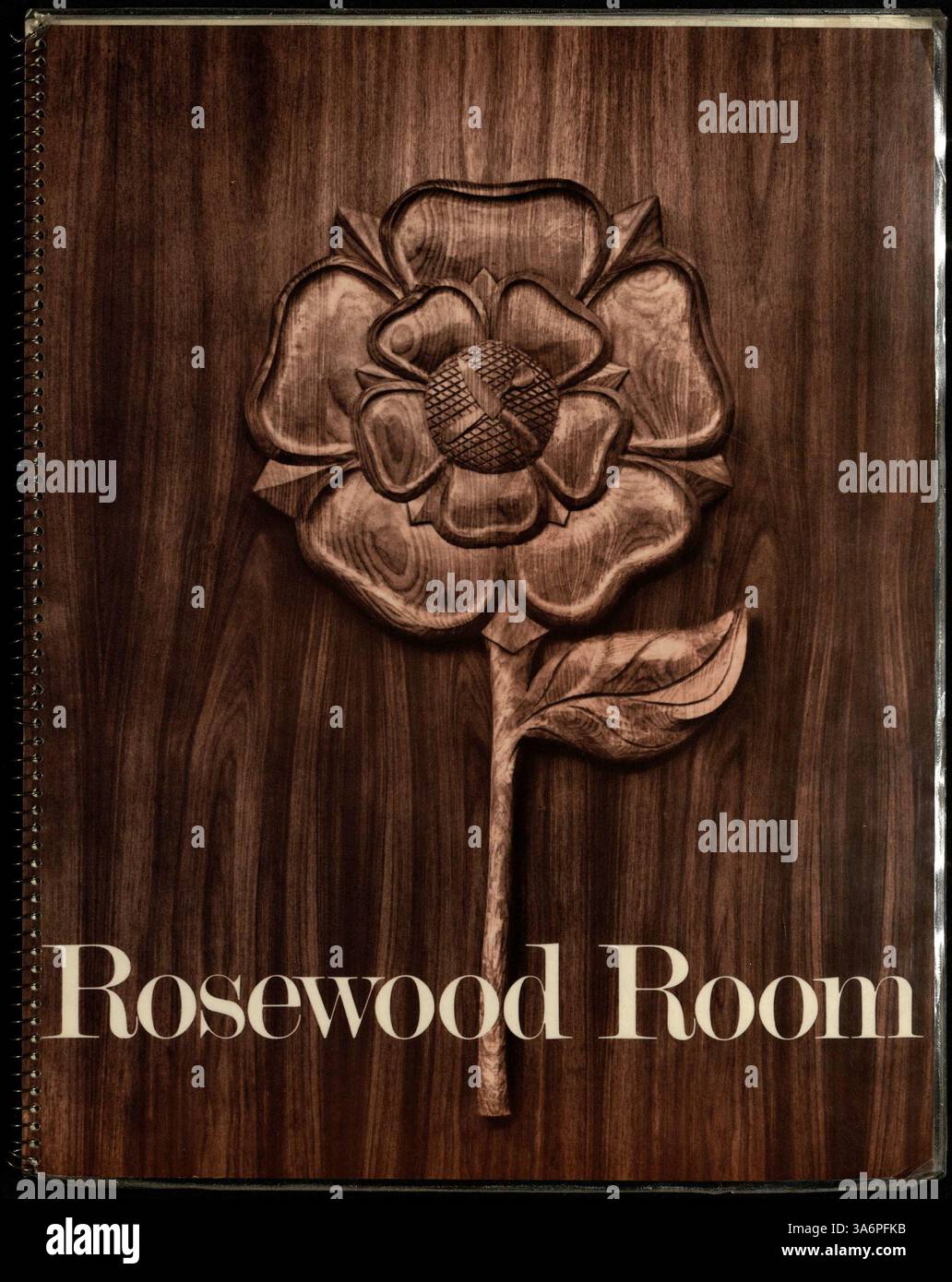 The Rosewood Room Menu is a laminated, spiral-bound booklet offering a ...