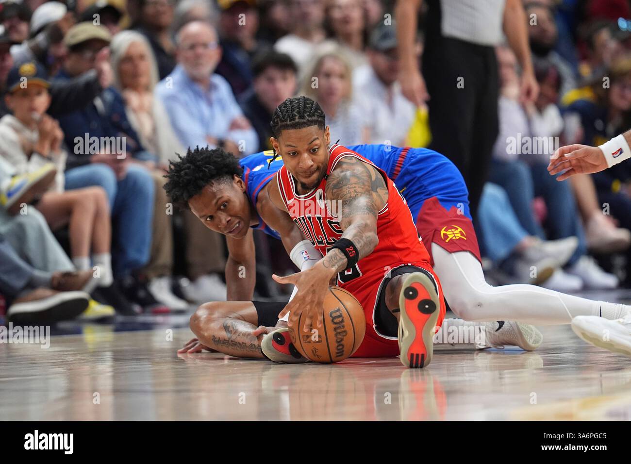 Chicago Bulls forward Dalen Terry (25) and Denver Nuggets forward ...