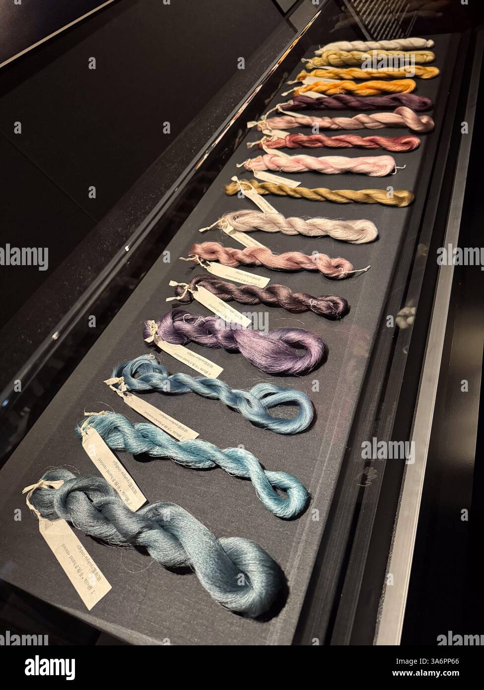 Colorful Silk Threads Display in Museum Exhibit Stock Photo - Alamy