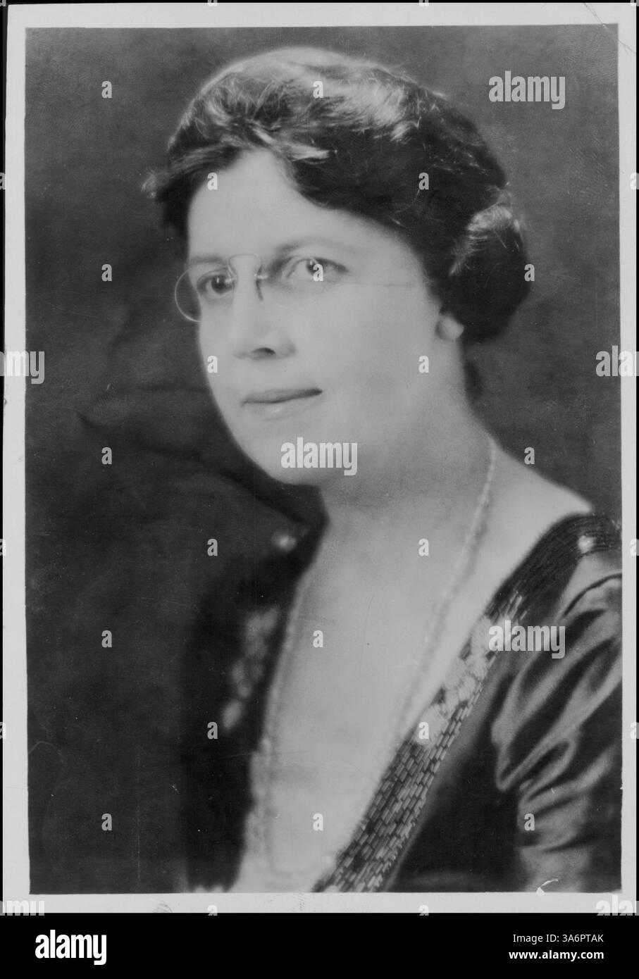 A historical portrait of Mrs. Arthur J. Edwards. This image likely ...