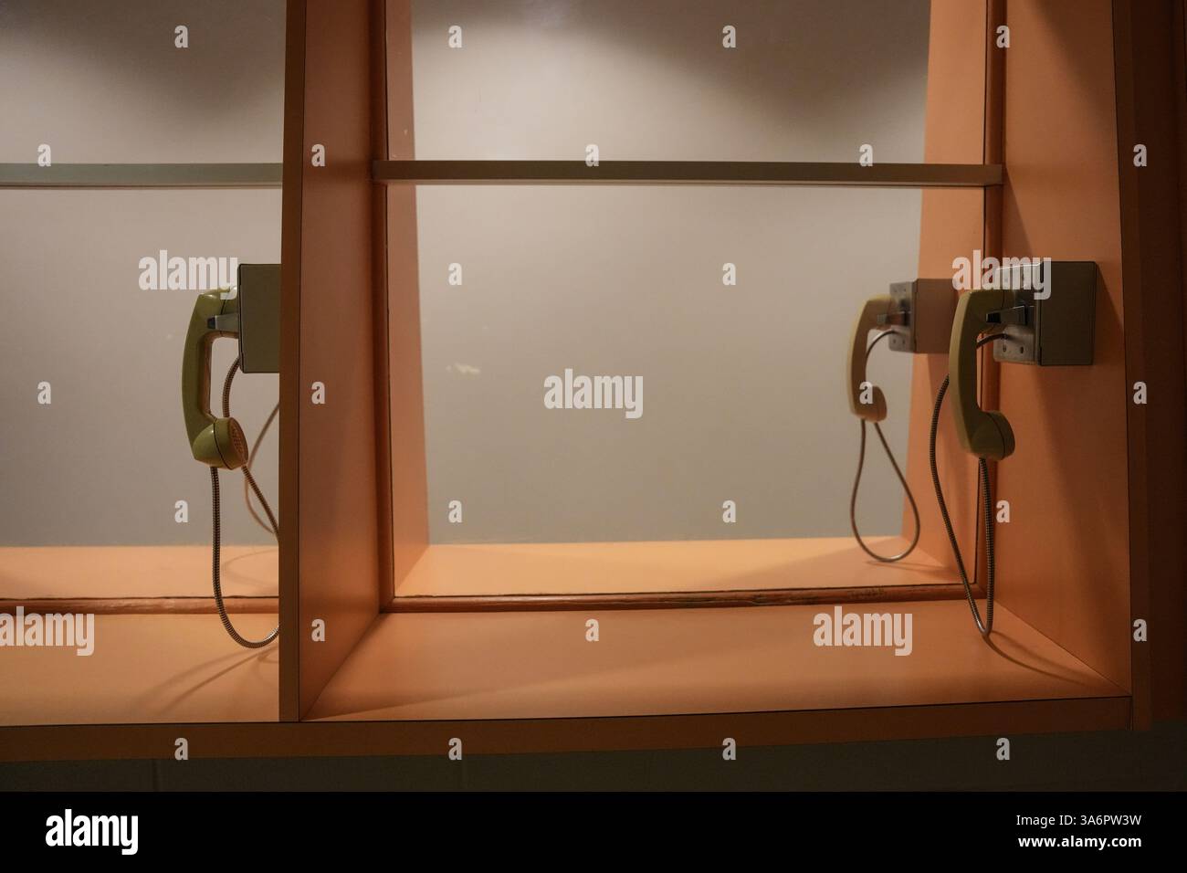 Toronto, Canada. 19th Feb, 2025. Phones hang in booths at a visiting ...