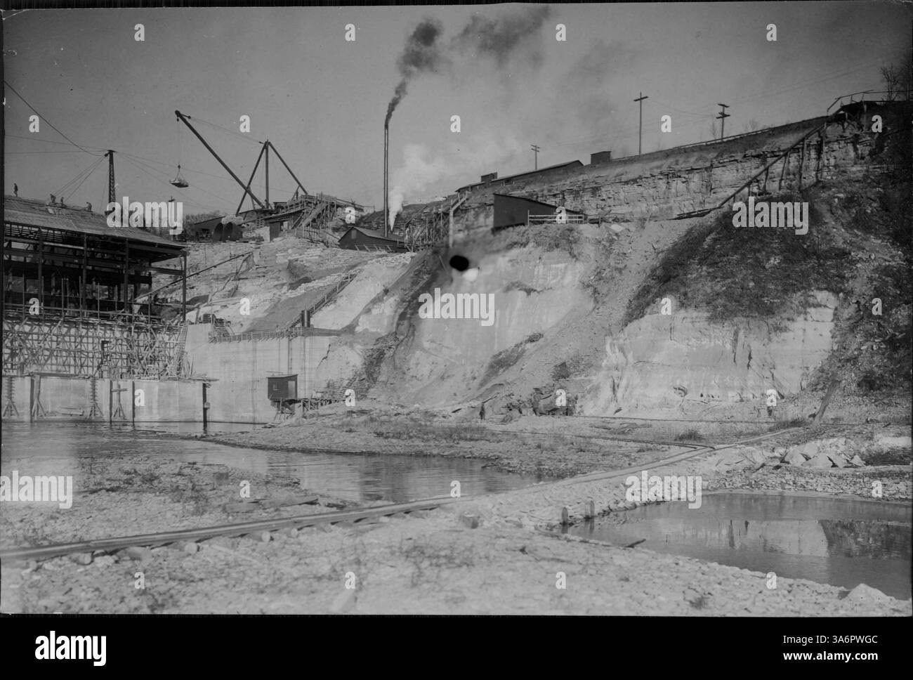 This image shows the construction of the Ford power plant and dam along ...