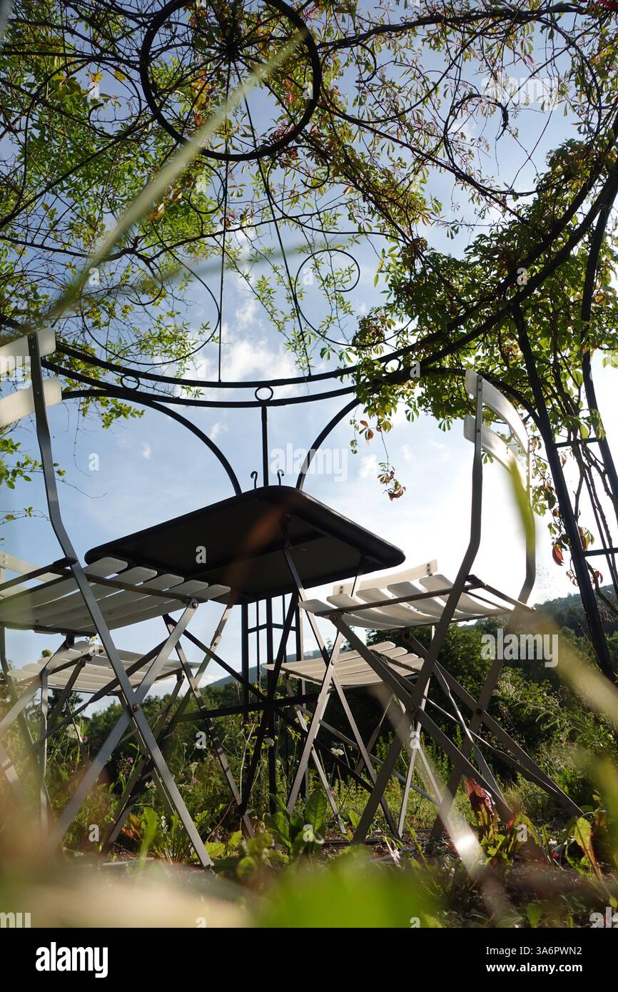 Scenic Outdoor Seating Under Pergola Stock Photo - Alamy