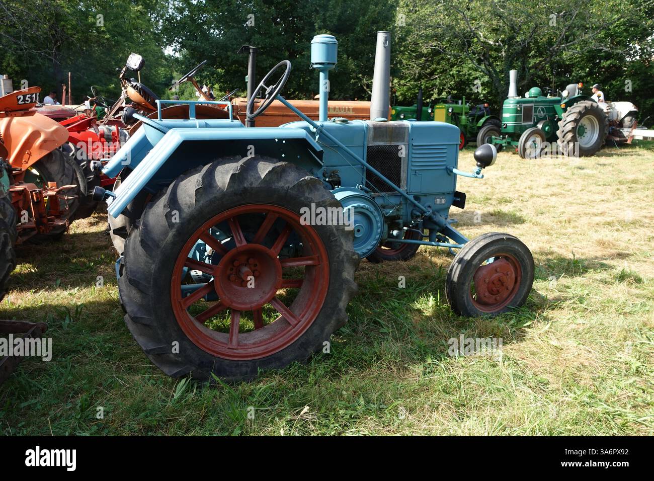 Restored Vintage Blue Tractor at Exhibition Stock Photo - Alamy