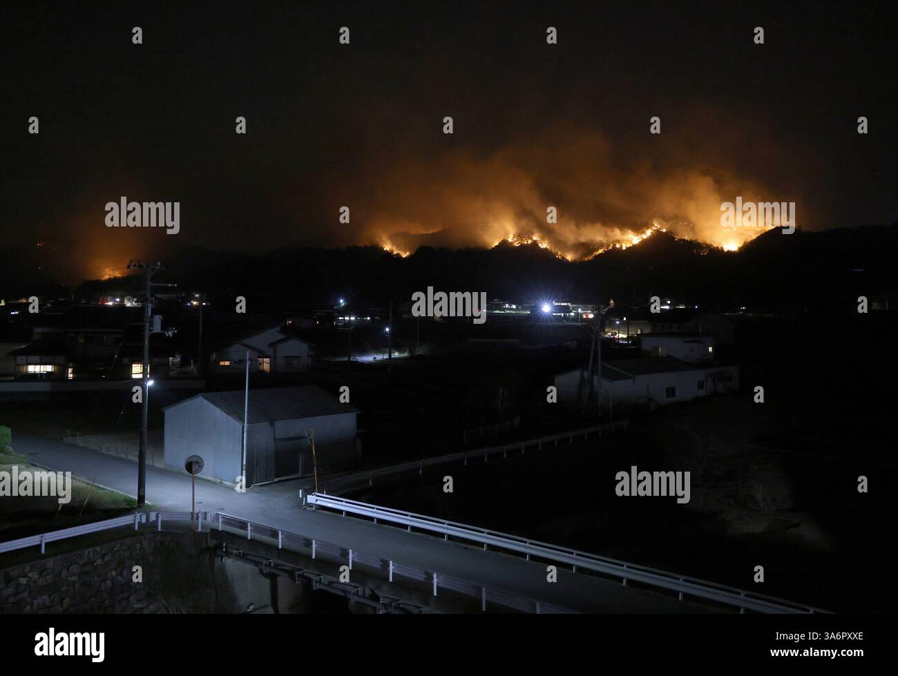 A photo shows a spreading forest fire in Imabari City, Ehime Prefecture ...