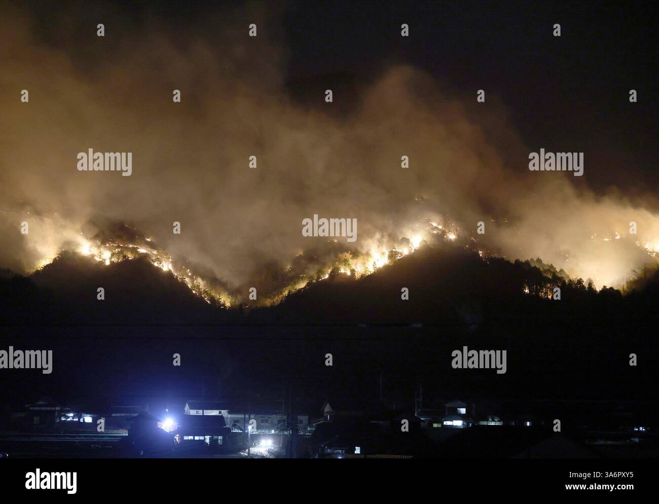 A photo shows a spreading forest fire in Imabari City, Ehime Prefecture ...