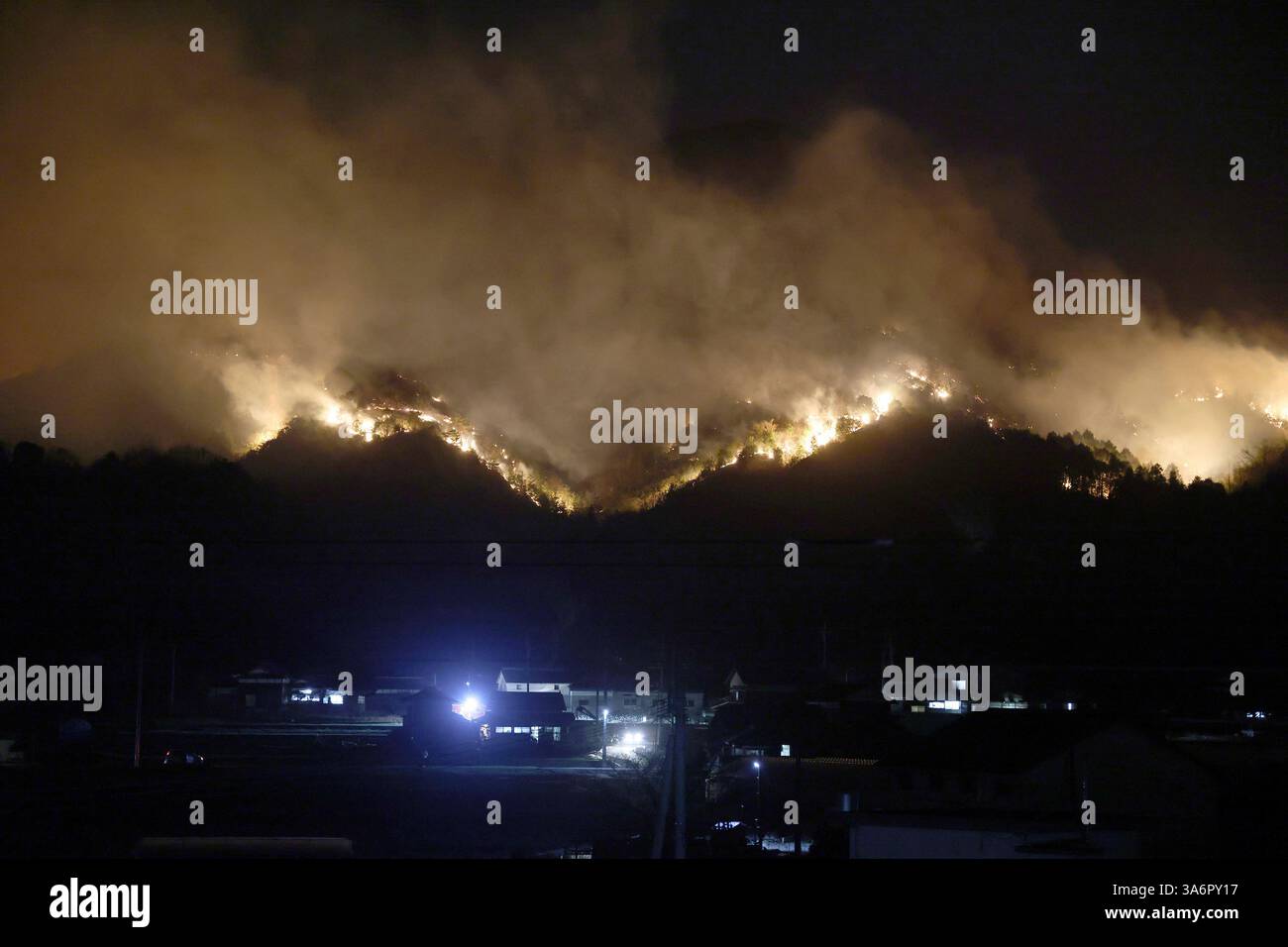 A photo shows a spreading forest fire in Imabari City, Ehime Prefecture ...