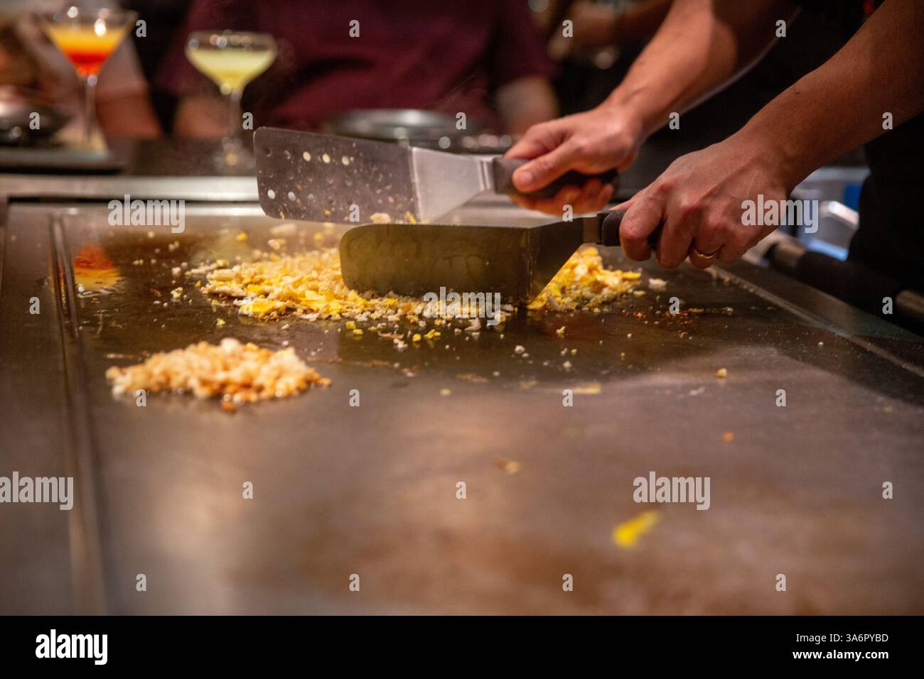 Making Japanese Fried Rice on a hibachi grill Stock Photo - Alamy