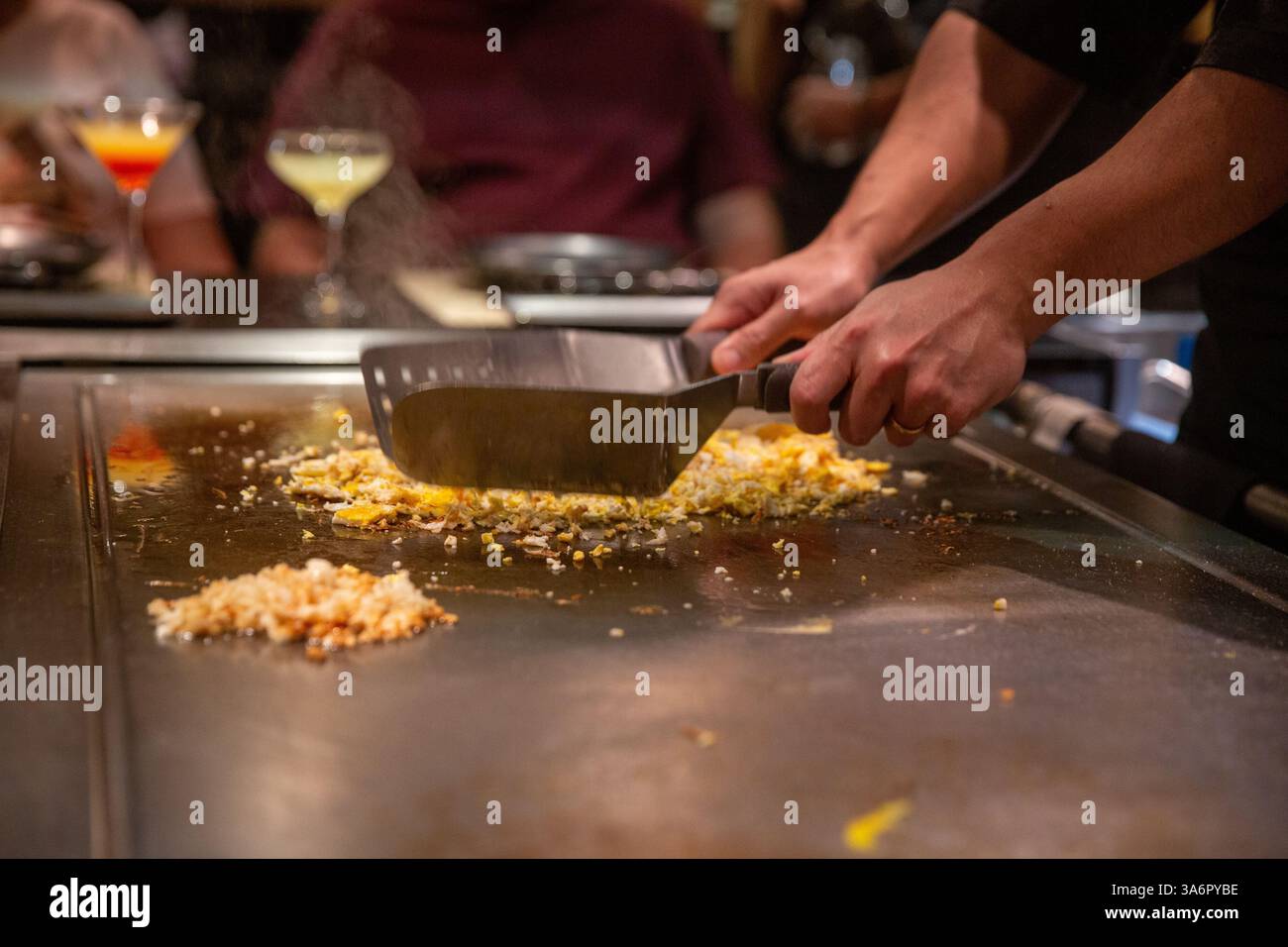 Making Japanese Fried Rice on a hibachi grill Stock Photo - Alamy
