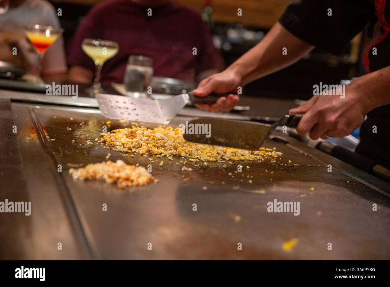 Making Japanese Fried Rice on a hibachi grill Stock Photo - Alamy
