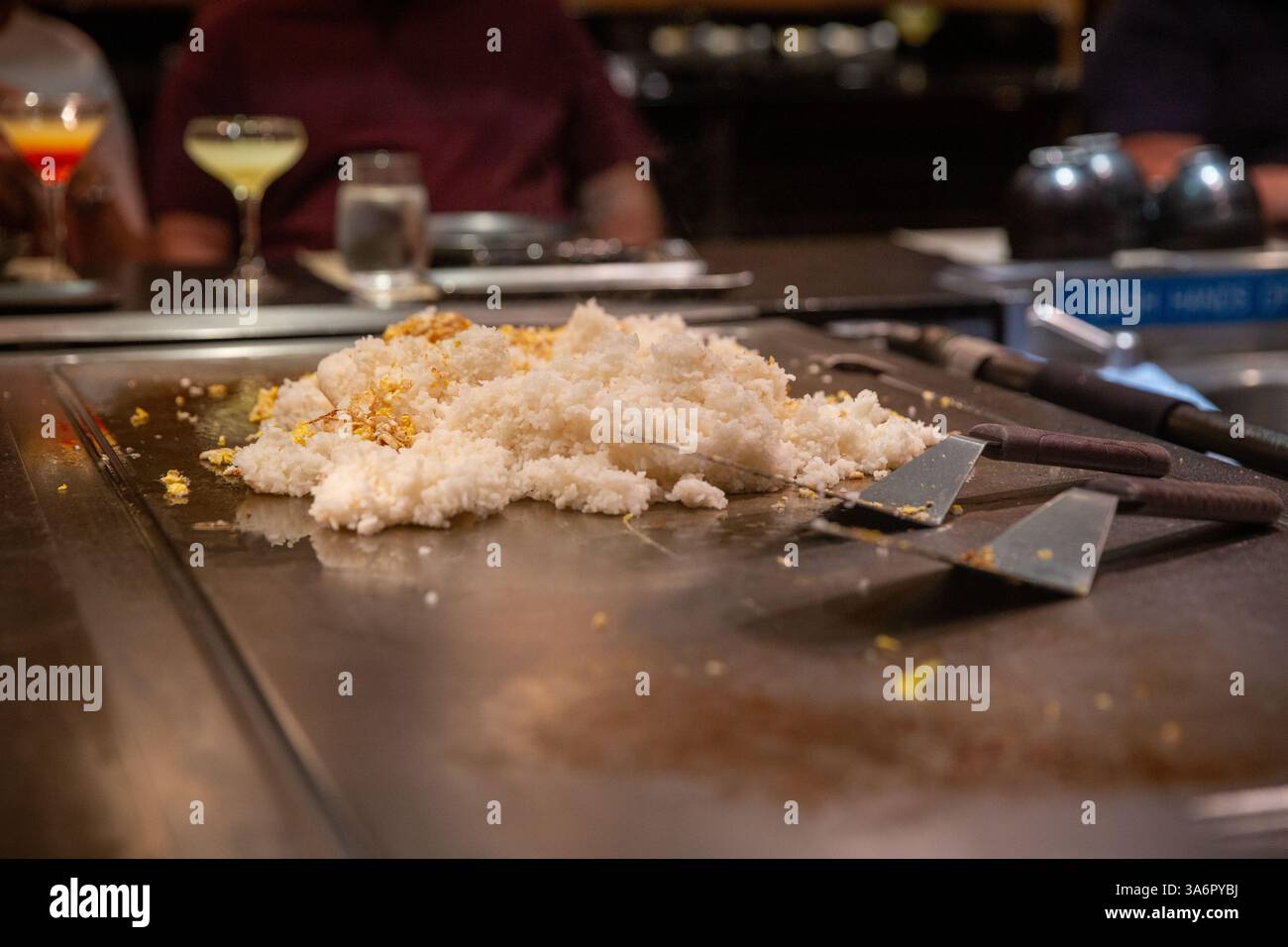 Making Japanese Fried Rice on a hibachi grill Stock Photo - Alamy