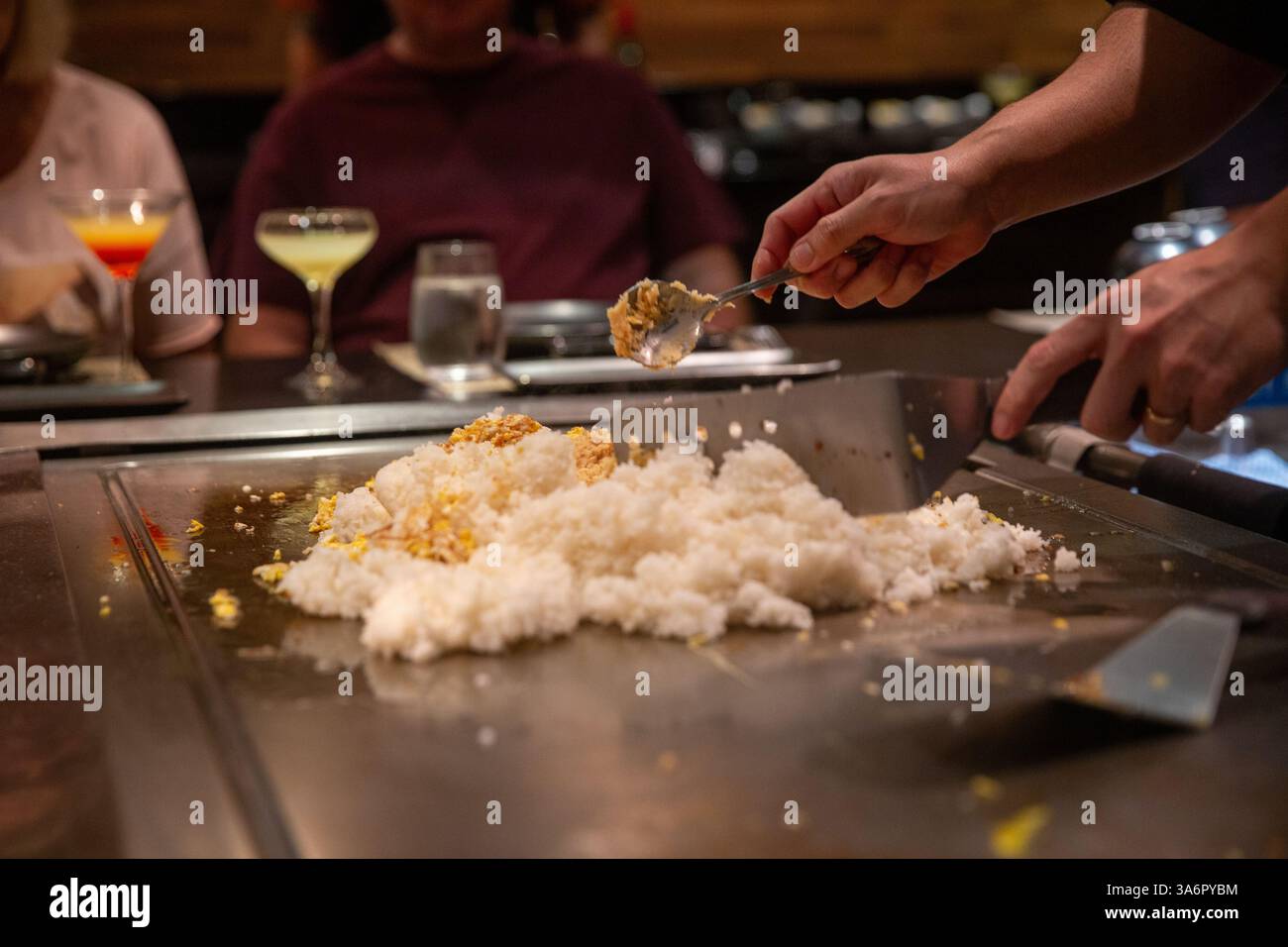 Making Japanese Fried Rice on a hibachi grill Stock Photo - Alamy