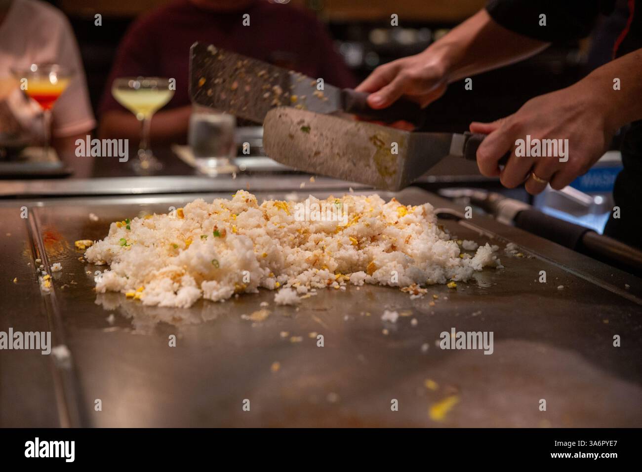 Making Japanese Fried Rice on a hibachi grill Stock Photo - Alamy
