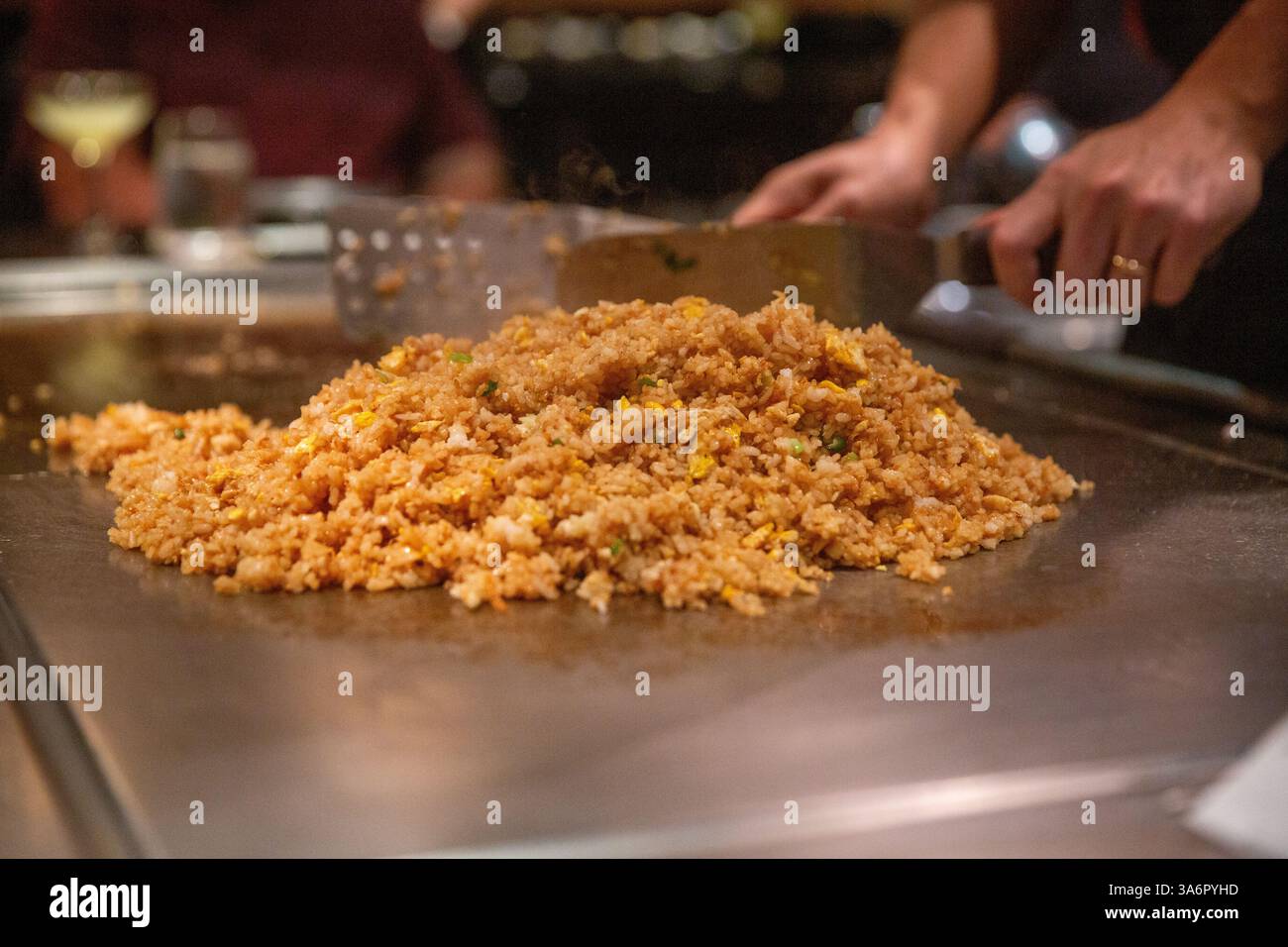 Making Japanese Fried Rice on a hibachi grill Stock Photo - Alamy