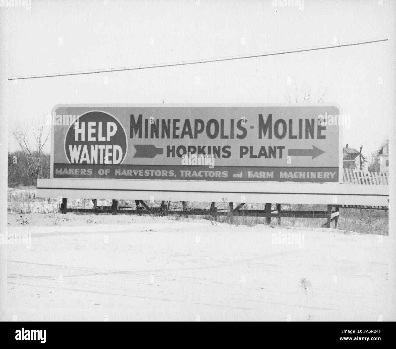 The billboard for the Minneapolis-Moline Hopkins Plant advertises its ...