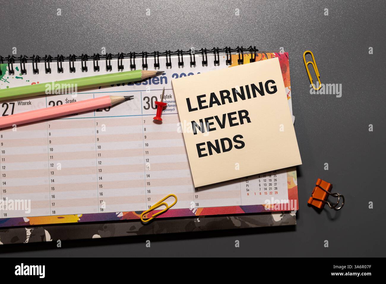 Learning never ends message on blackboard with human head shape and ...