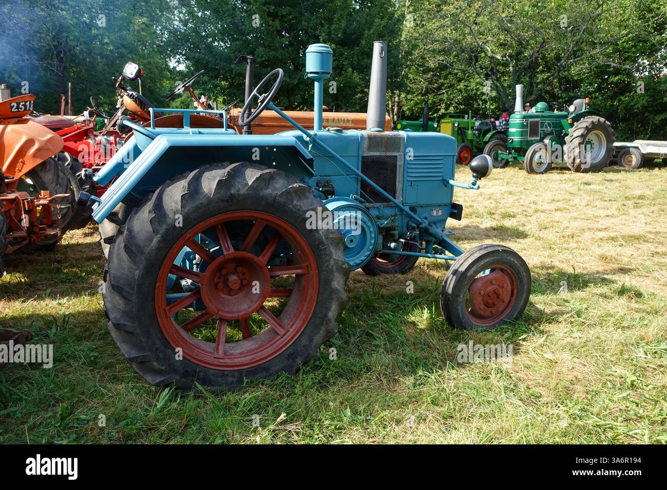 Restored Vintage Blue Tractor at Exhibition Stock Photo - Alamy