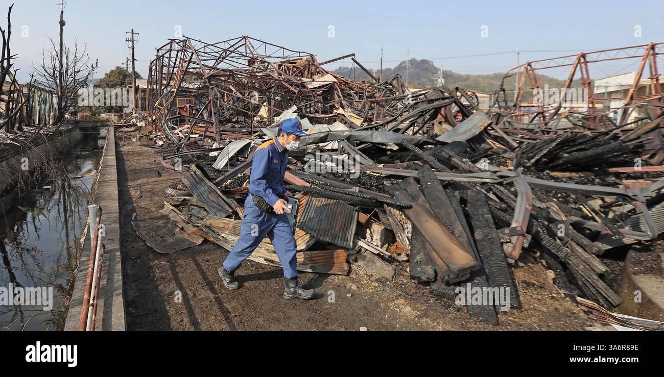 A photo shows burnt houses due to forest fire in Imabari City, Ehime ...