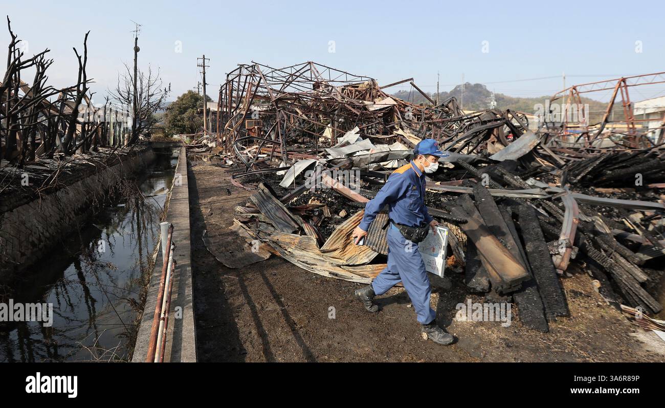 A photo shows burnt houses due to forest fire in Imabari City, Ehime ...