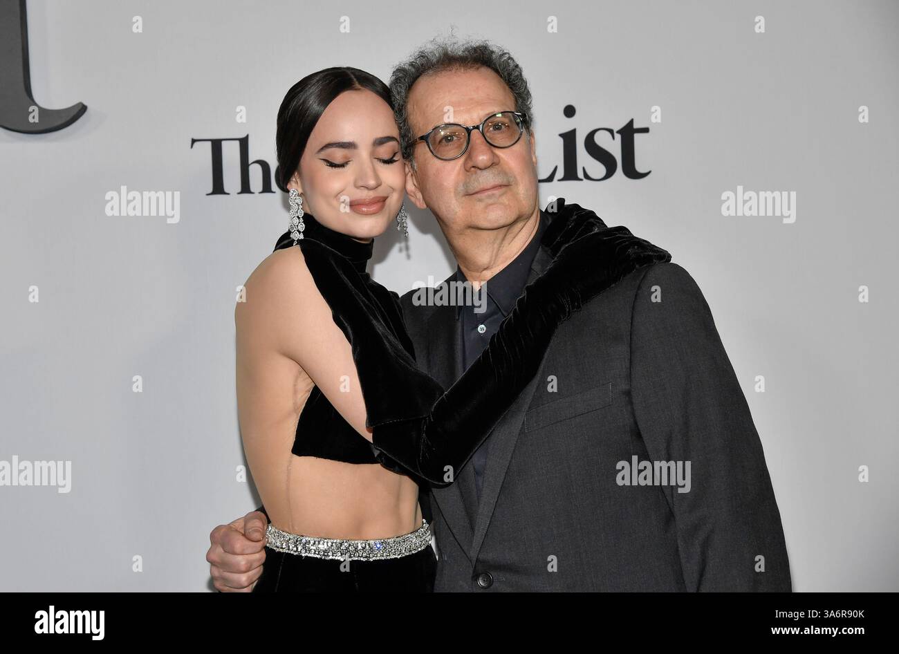 Actor Sofia Carson, left, and director Adam Brooks attend the premiere ...