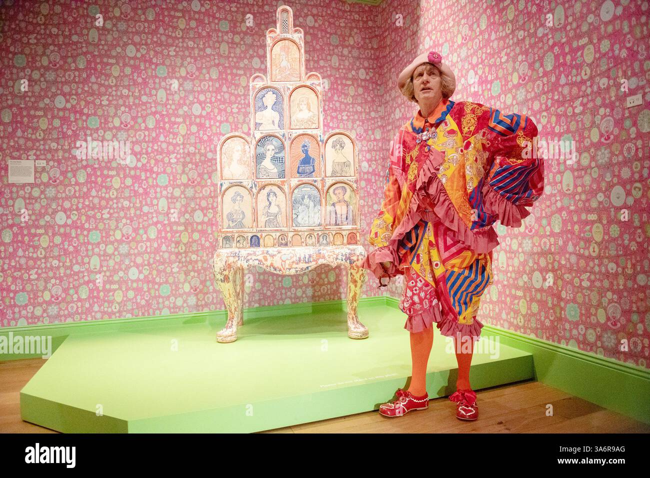 London, UK. 25 Mar 2025. Pictured: Artist Grayson Perry poses with 'The ...