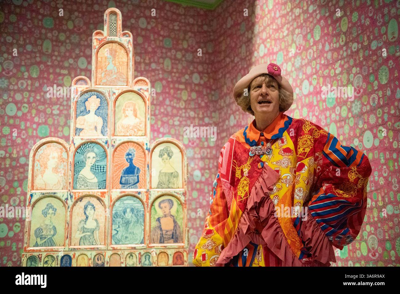 London, UK. 25 Mar 2025. Pictured: Artist Grayson Perry poses with 'The ...
