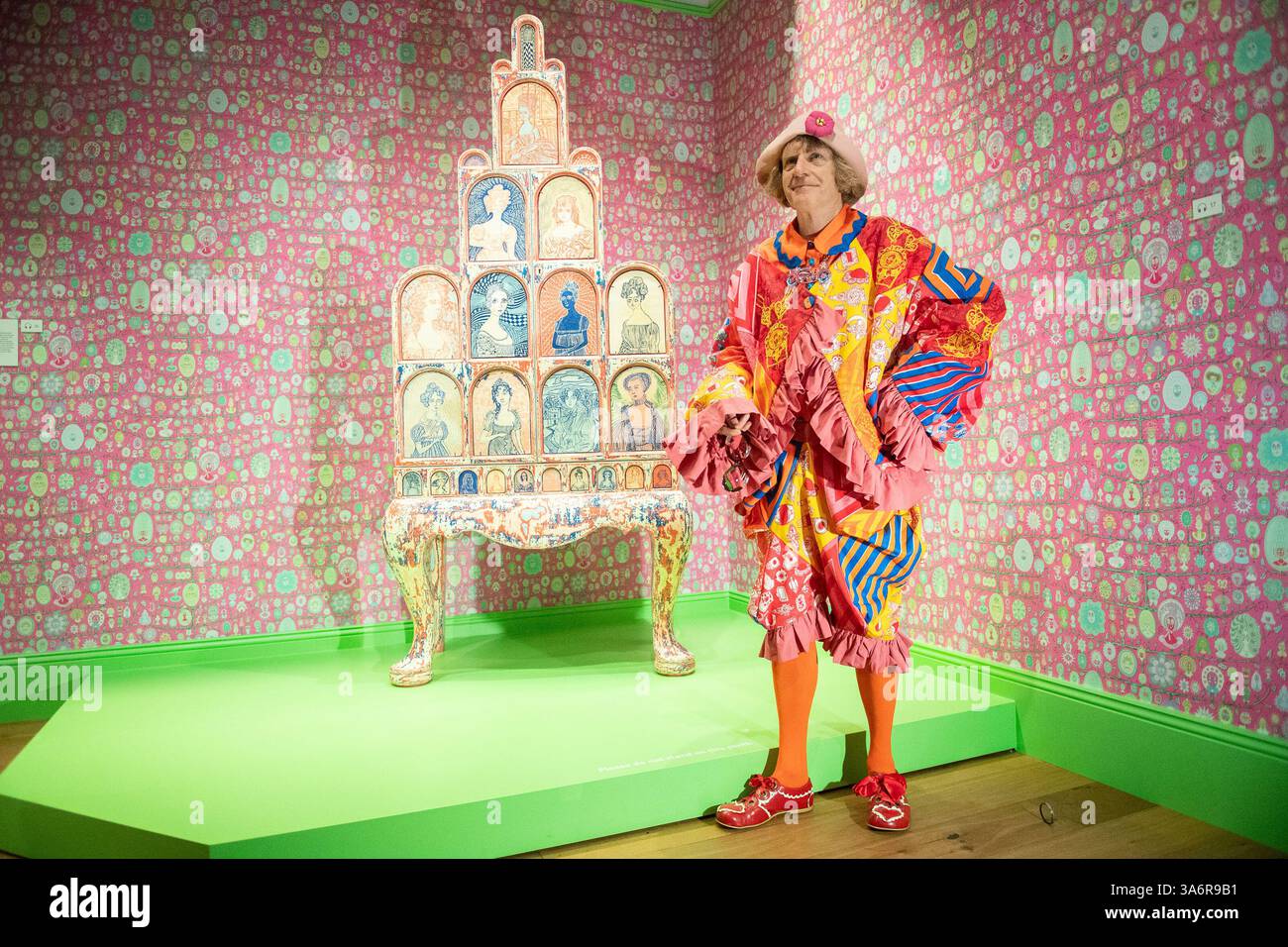London, UK. 25 Mar 2025. Pictured: Artist Grayson Perry poses with 'The ...