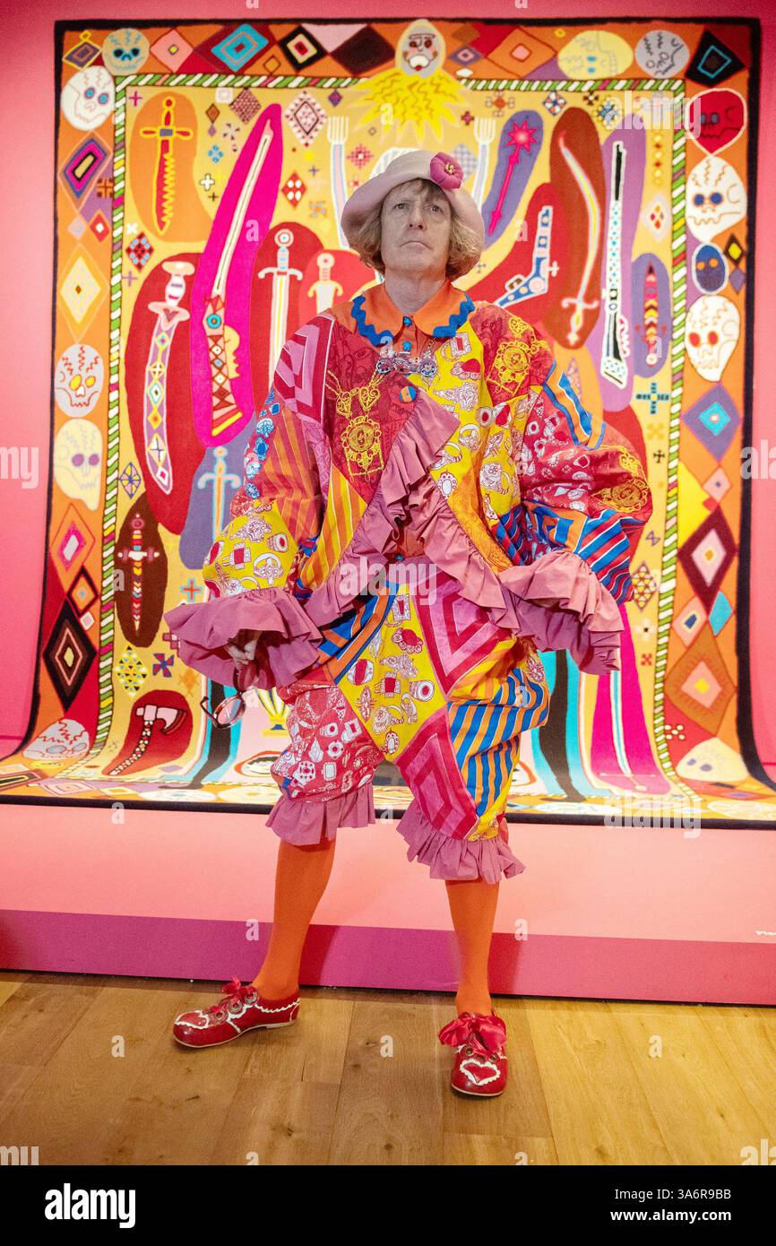 London, UK. 25 Mar 2025. Pictured: Artist Grayson Perry poses with ...