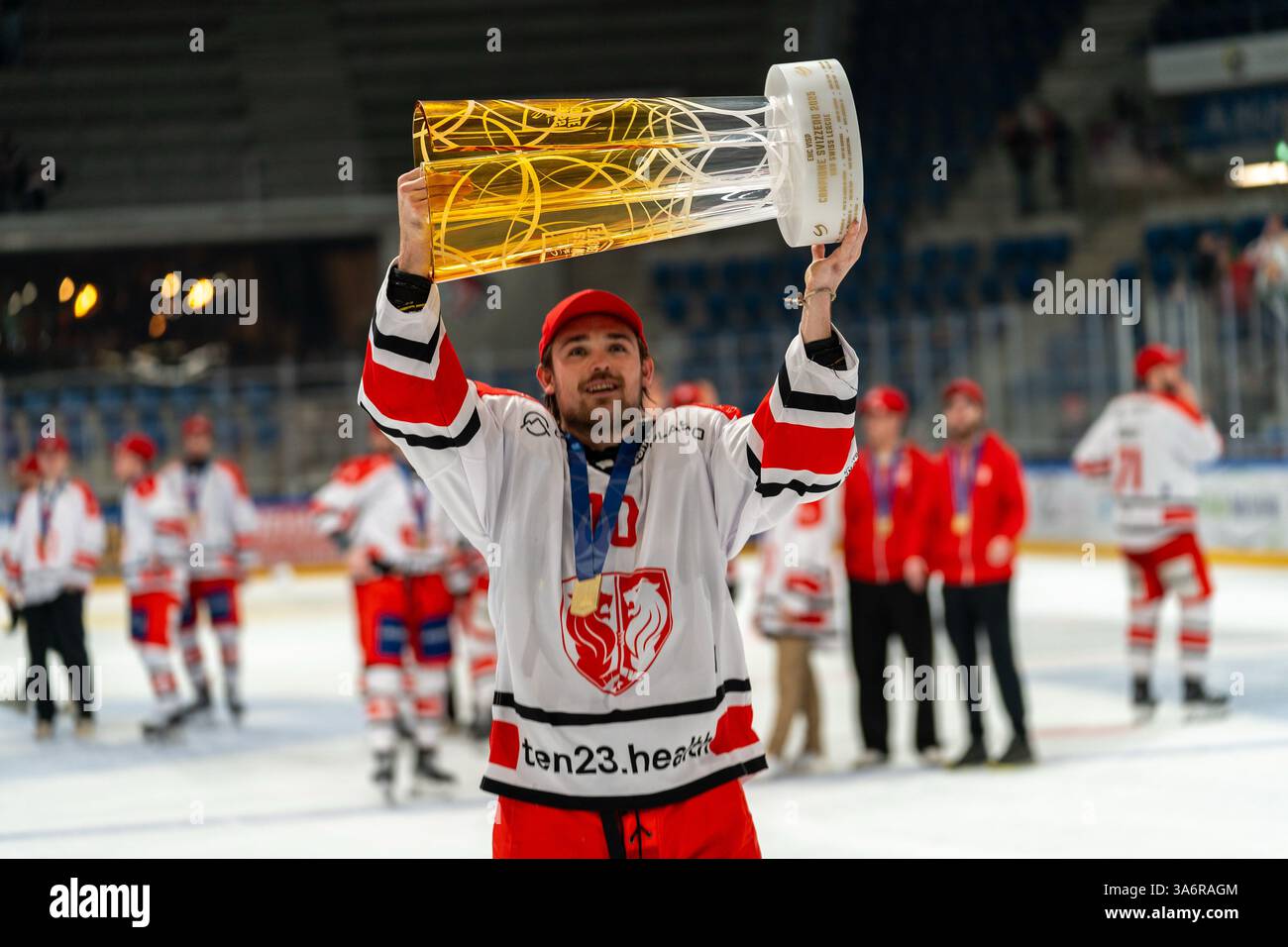 Basel, Schweiz, 25.03.2025 #10, Yannick Brüschweiler (EHC Visp) with Trophy after the Playoff ...
