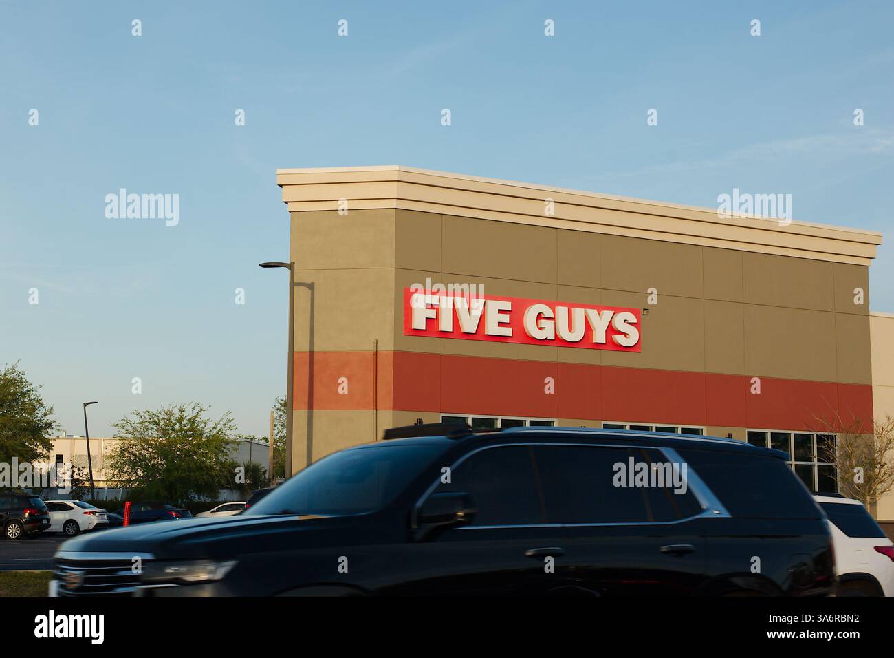 Editorial Use Only March 22, 2025. St. Petersburg, FL, USA, Exterior signage of a Five Guys ...