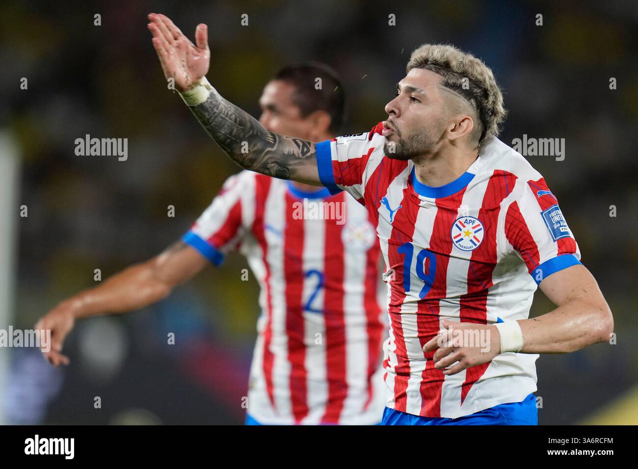 Paraguay's Julio Enciso celebrates scoring his side's second goal ...