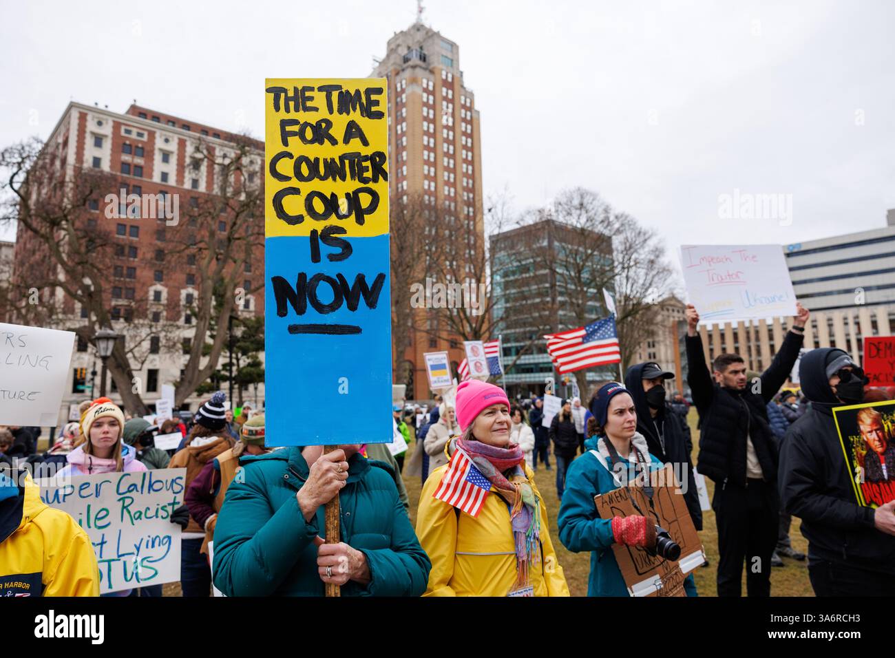 Lansing, USA. 04th Mar, 2025. Protesters attend a "March Forth" rally ...