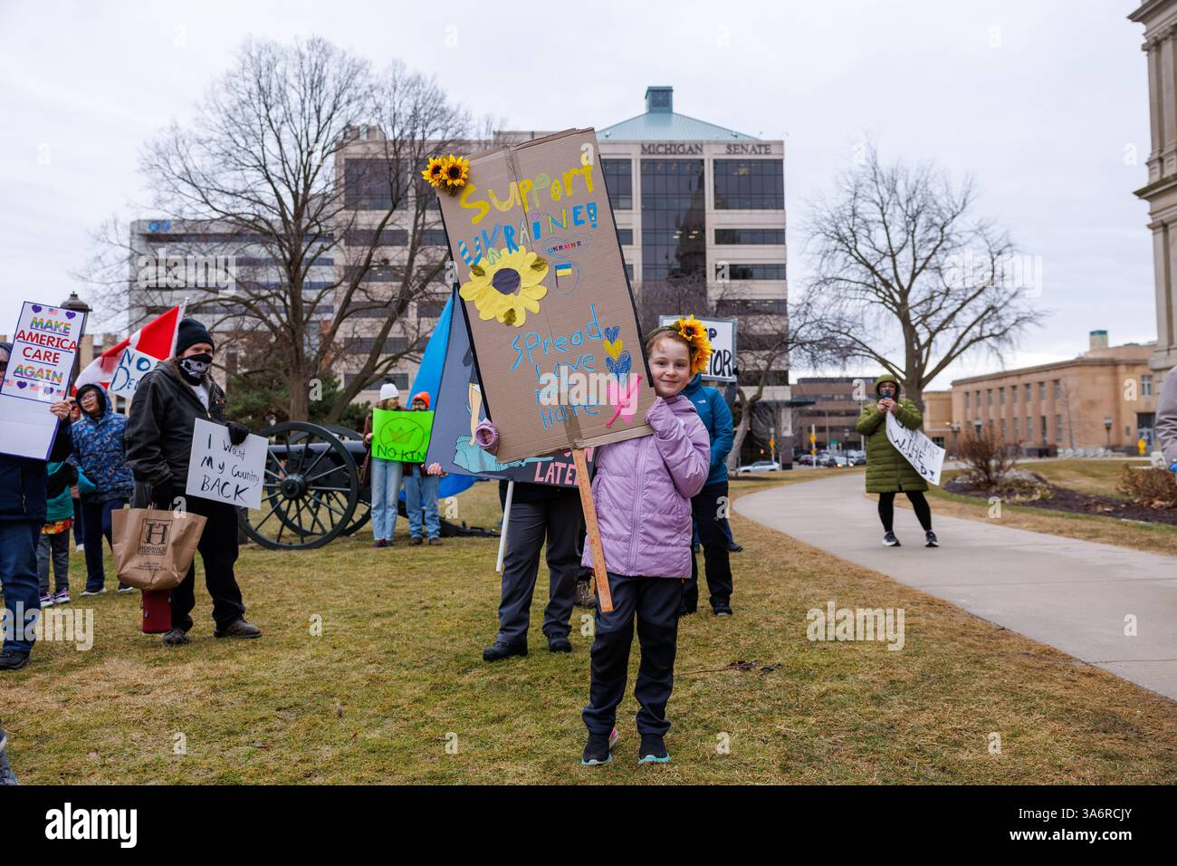 Protesters attend a "March Forth" rally at the Michigan Capitol in ...