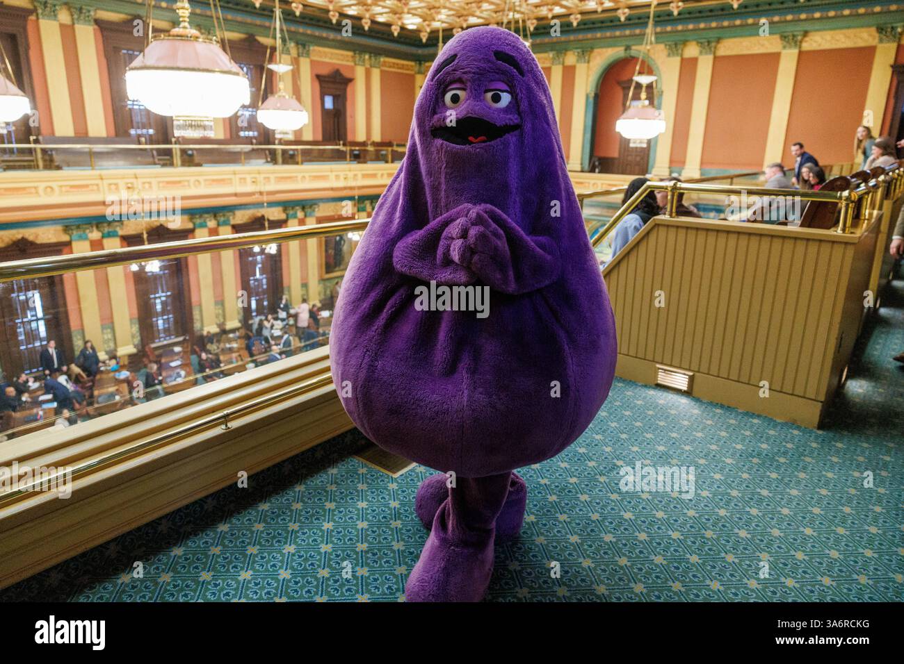 Lansing, USA. 18th Mar, 2025. McDonald's mascot Grimace attends session ...