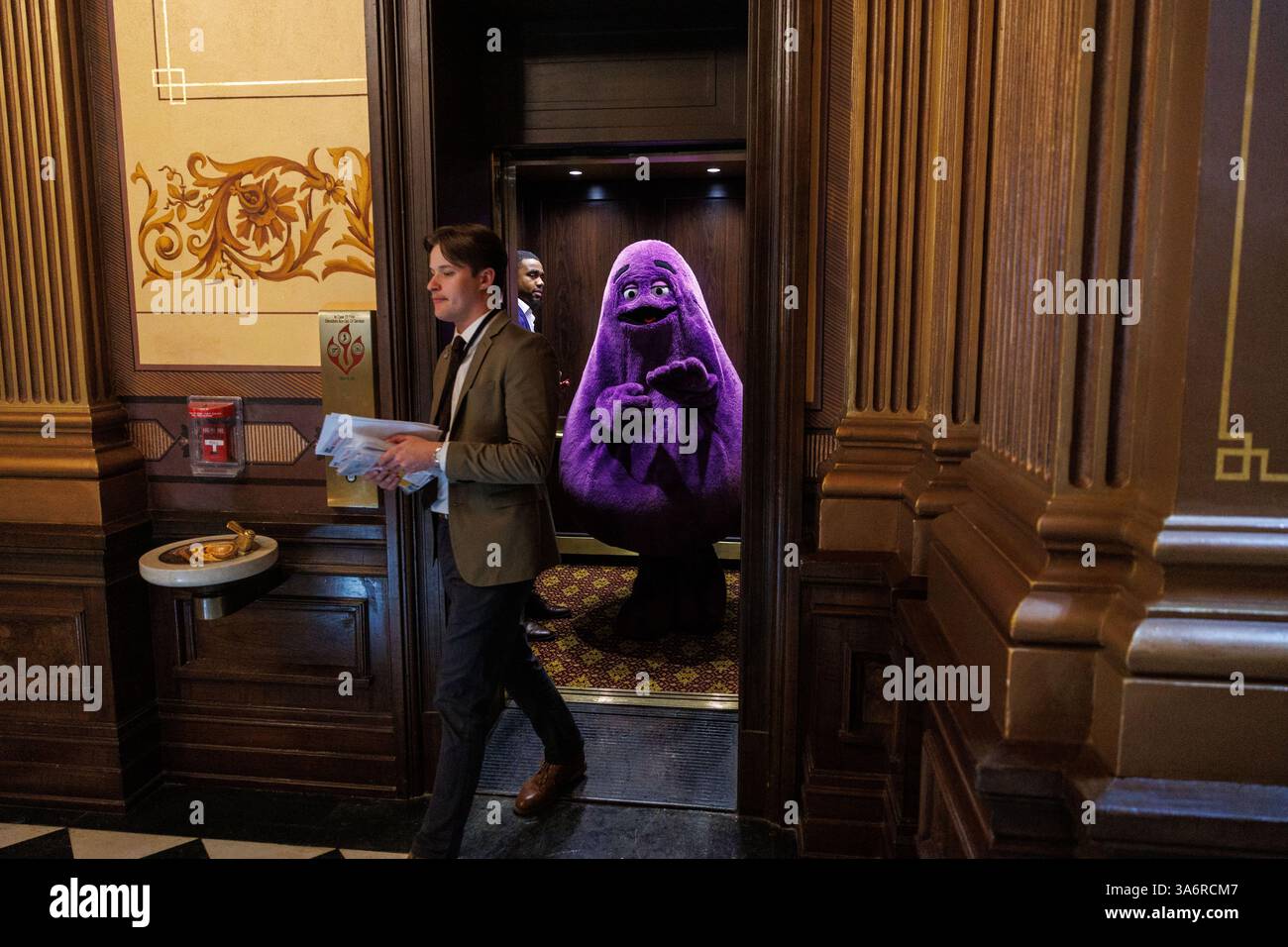 McDonald's mascot Grimace visits the Michigan Capitol on March 18, 2025 ...