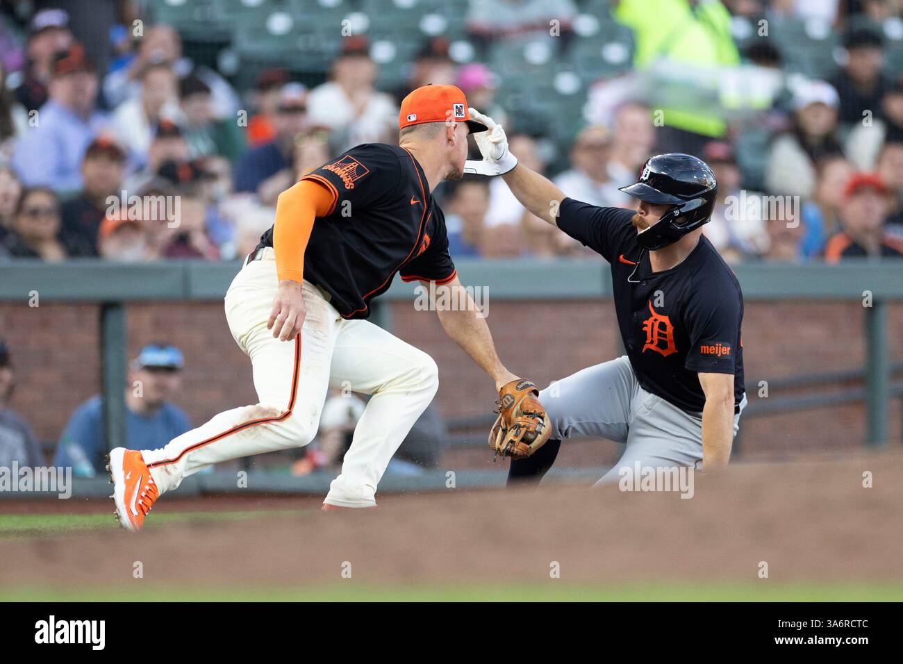 Detroit Tigers' Jake Rogers slides past San Francisco Giants third ...